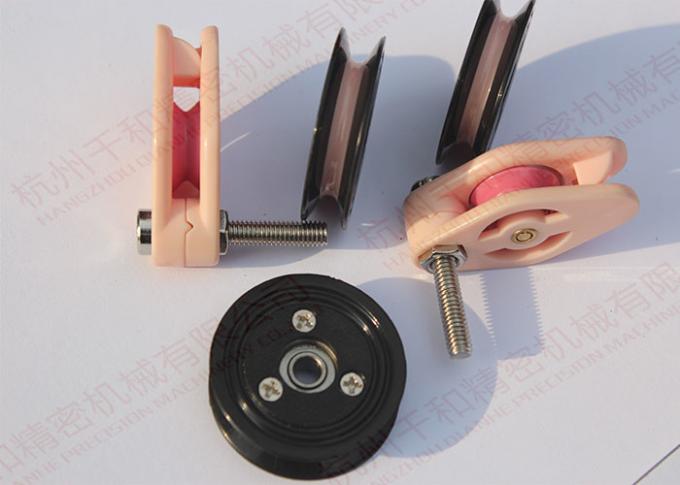 Pink color Roller plastic cable pulley with high speed bearing , 95% ...
